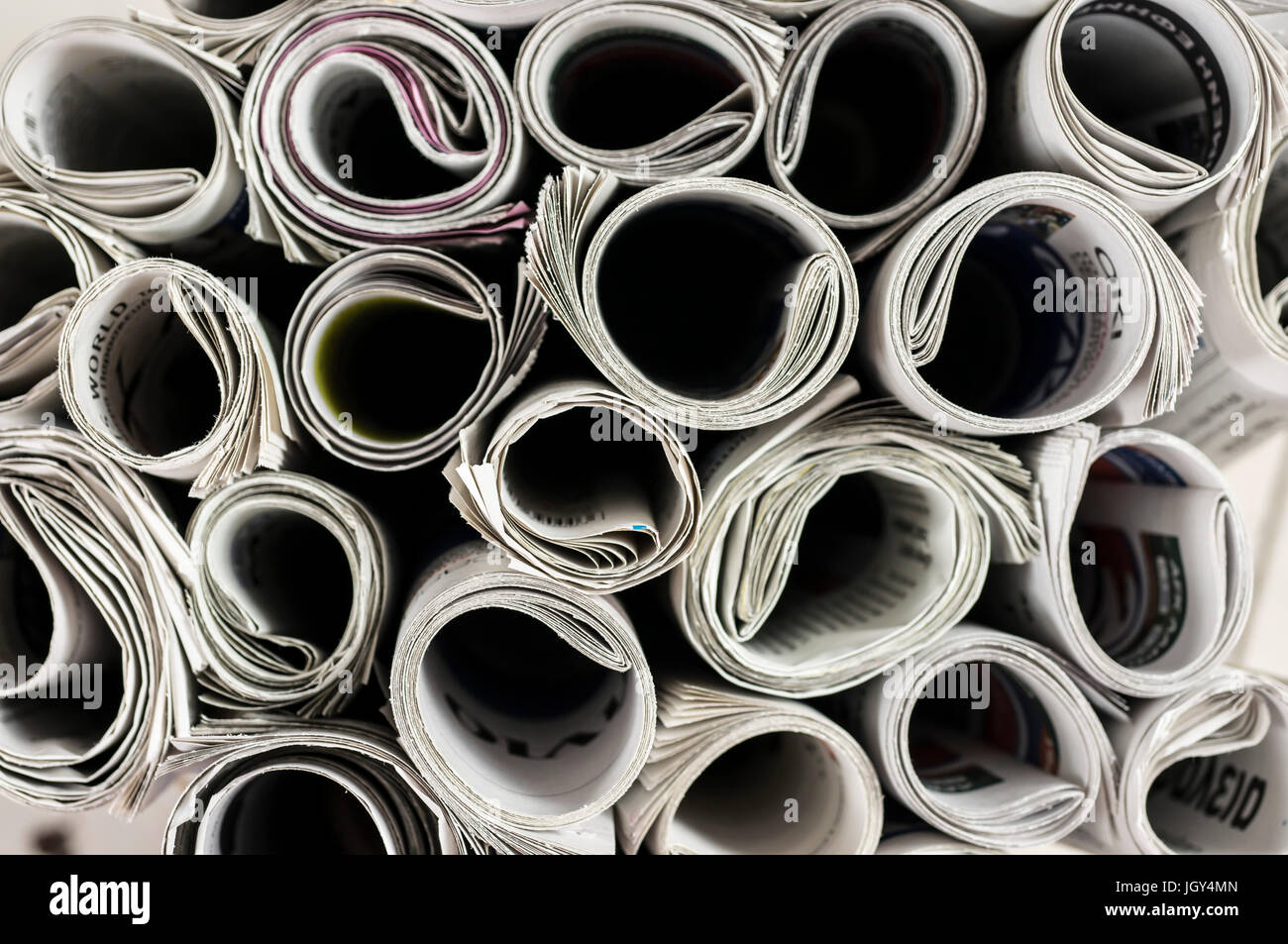 Rolled newspapers hi-res stock photography and images - Alamy