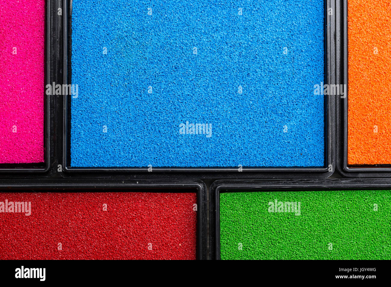 Close up shot of different colors of ink boxes Stock Photo - Alamy