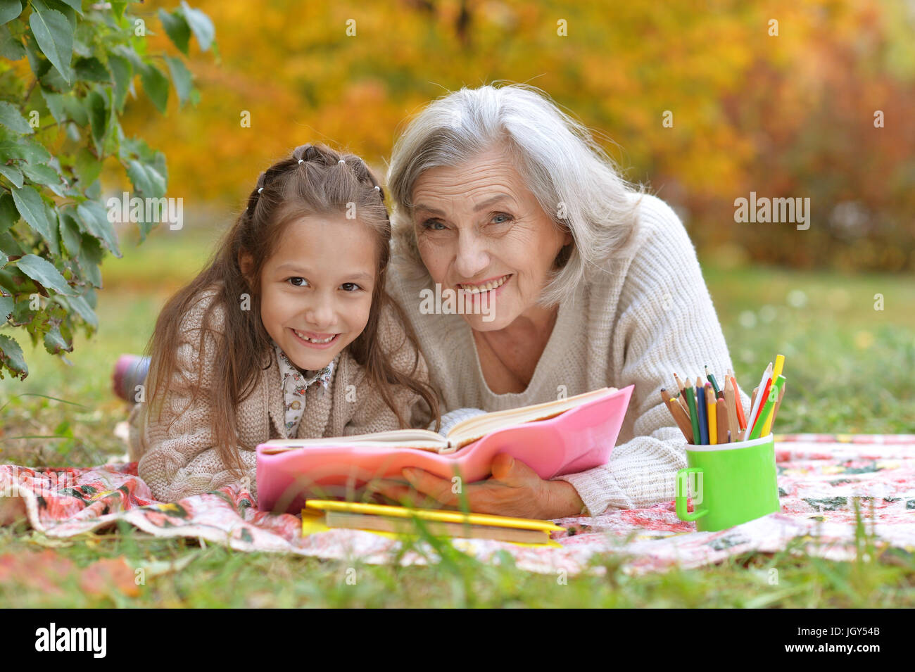 Grandmother child reading hi-res stock photography and images - Alamy