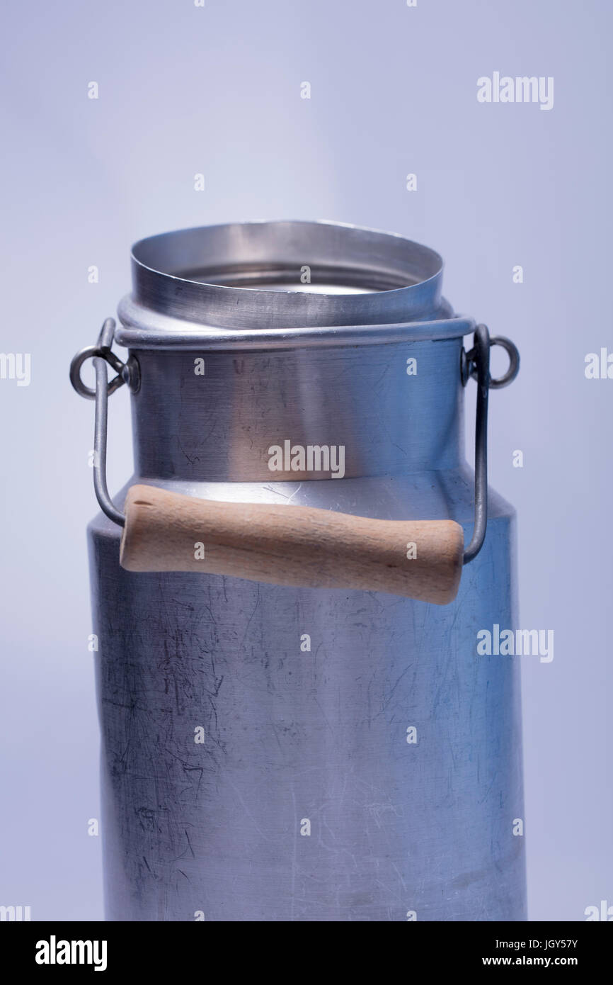 Milk churn used as a pot hi-res stock photography and images - Alamy