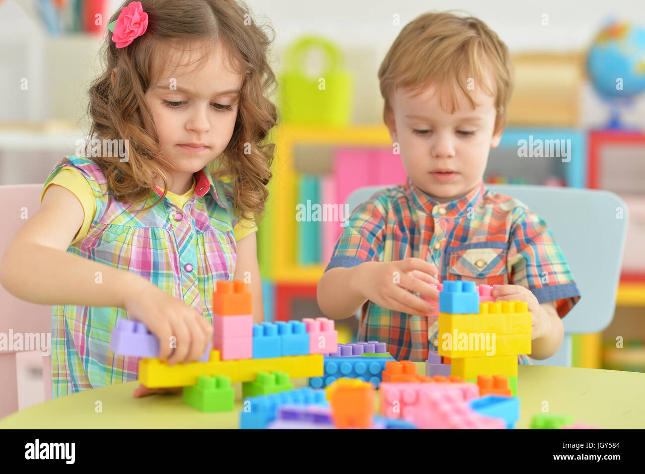 Cute children playing together hi-res stock photography and images - Alamy