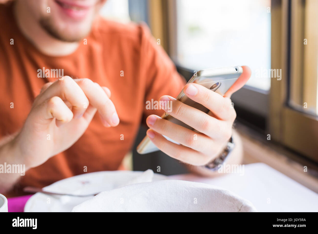 leisure, technology, communication and people concept - close up of man ...