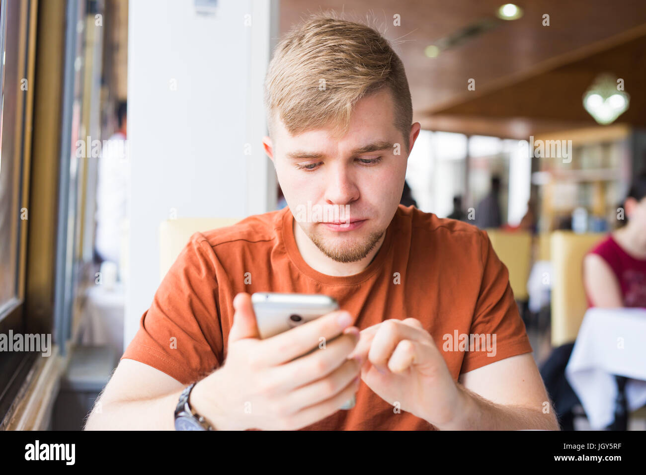 leisure, technology, communication and people concept - close up of man ...