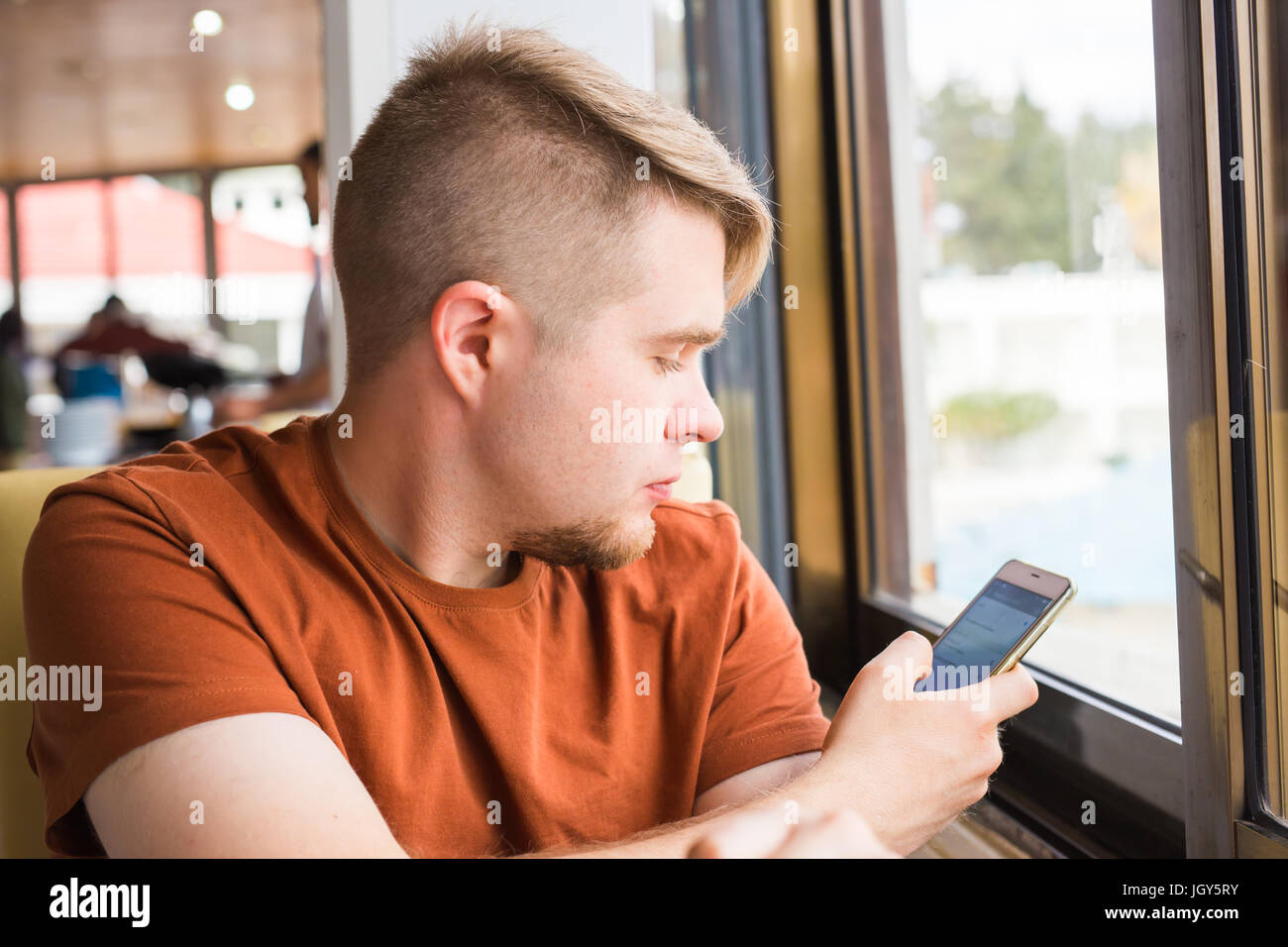 leisure, technology, communication and people concept - close up of man ...
