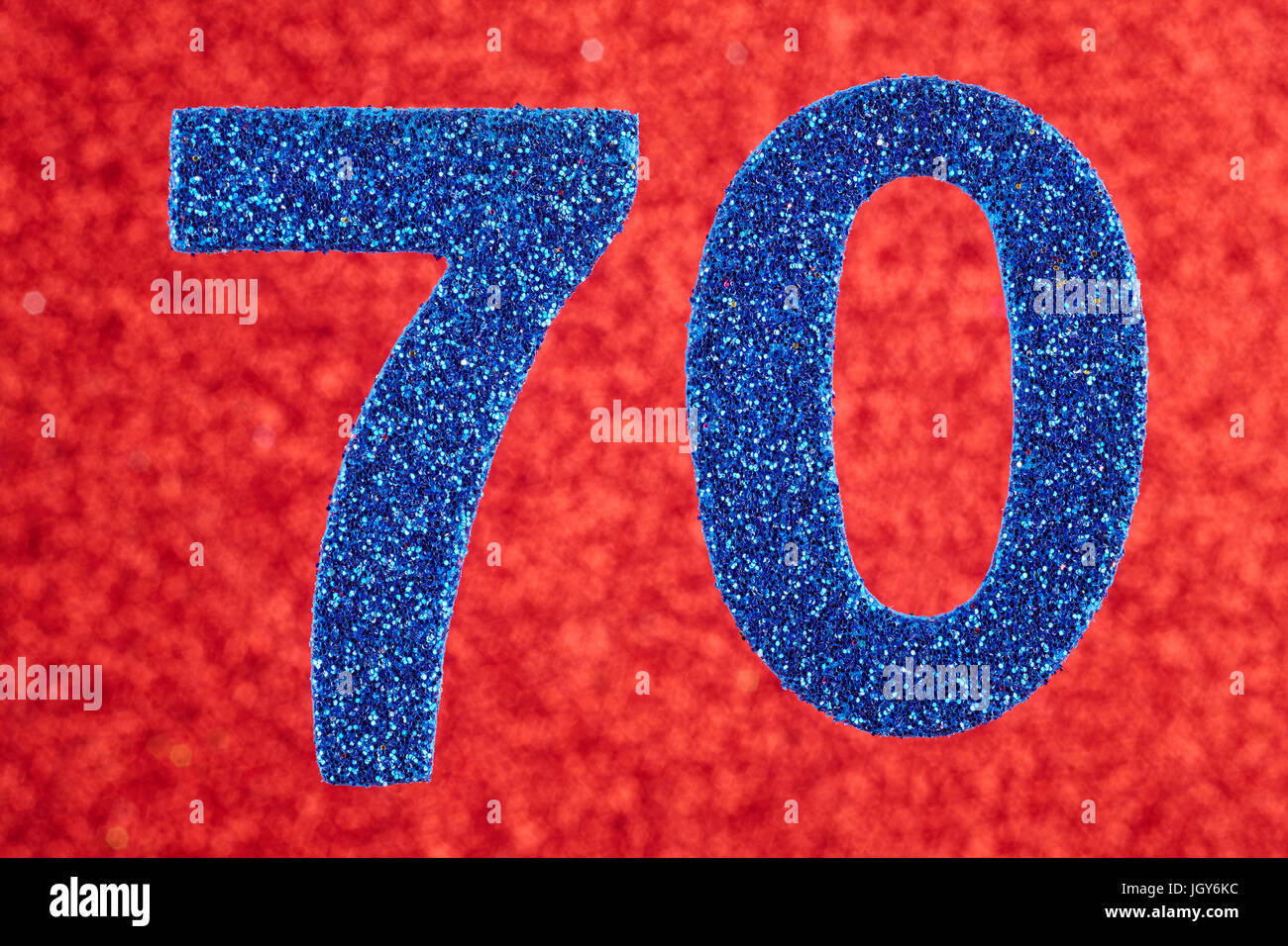 Number seventy blue color over a red background. Anniversary ...