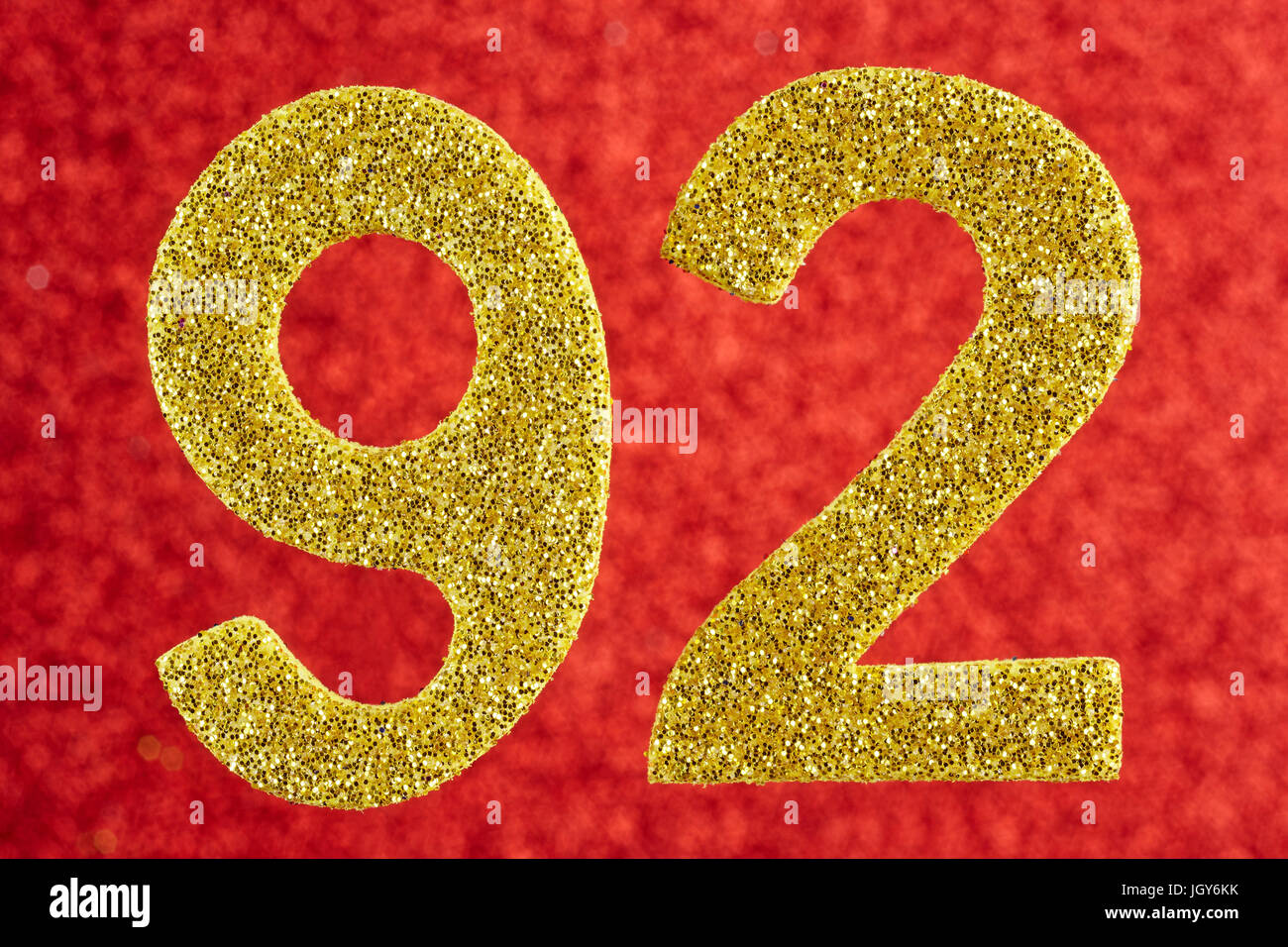 Number ninety-two yellow color over a red background. Anniversary ...