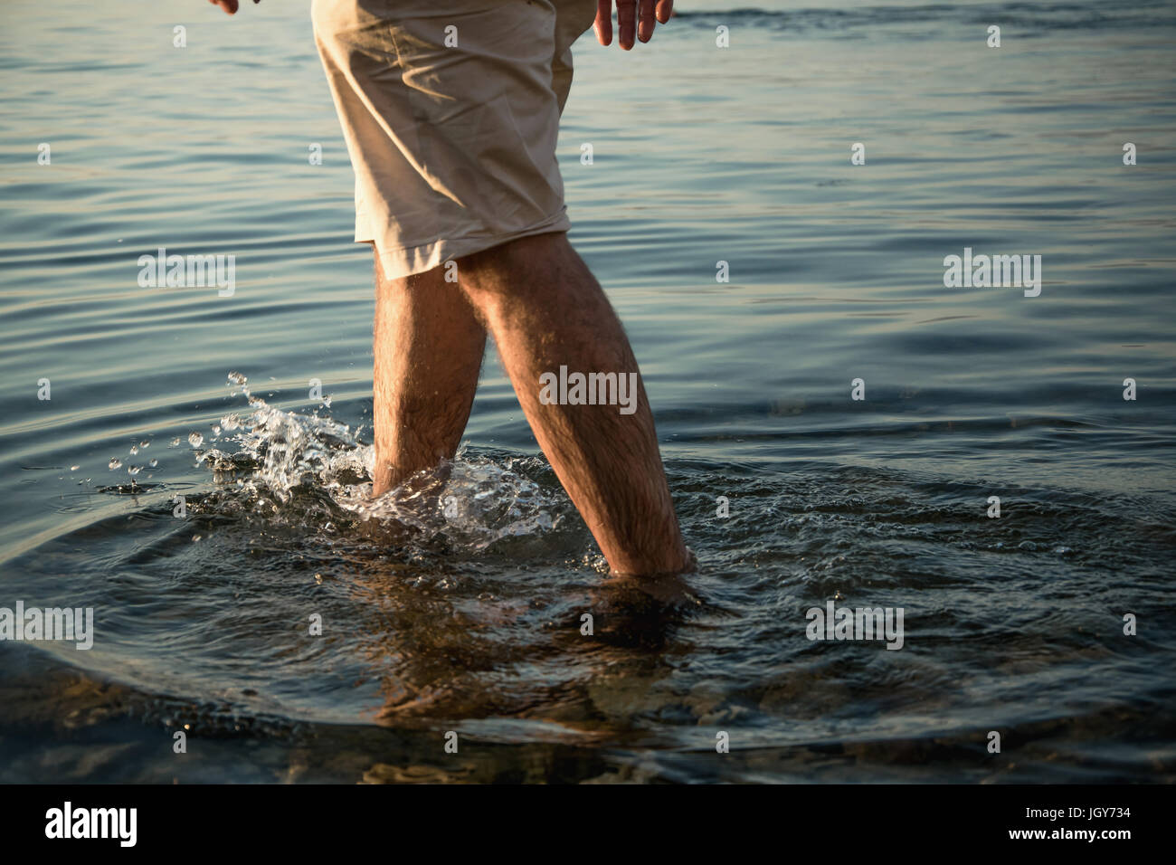 Man standing in flood water hi-res stock photography and images - Alamy