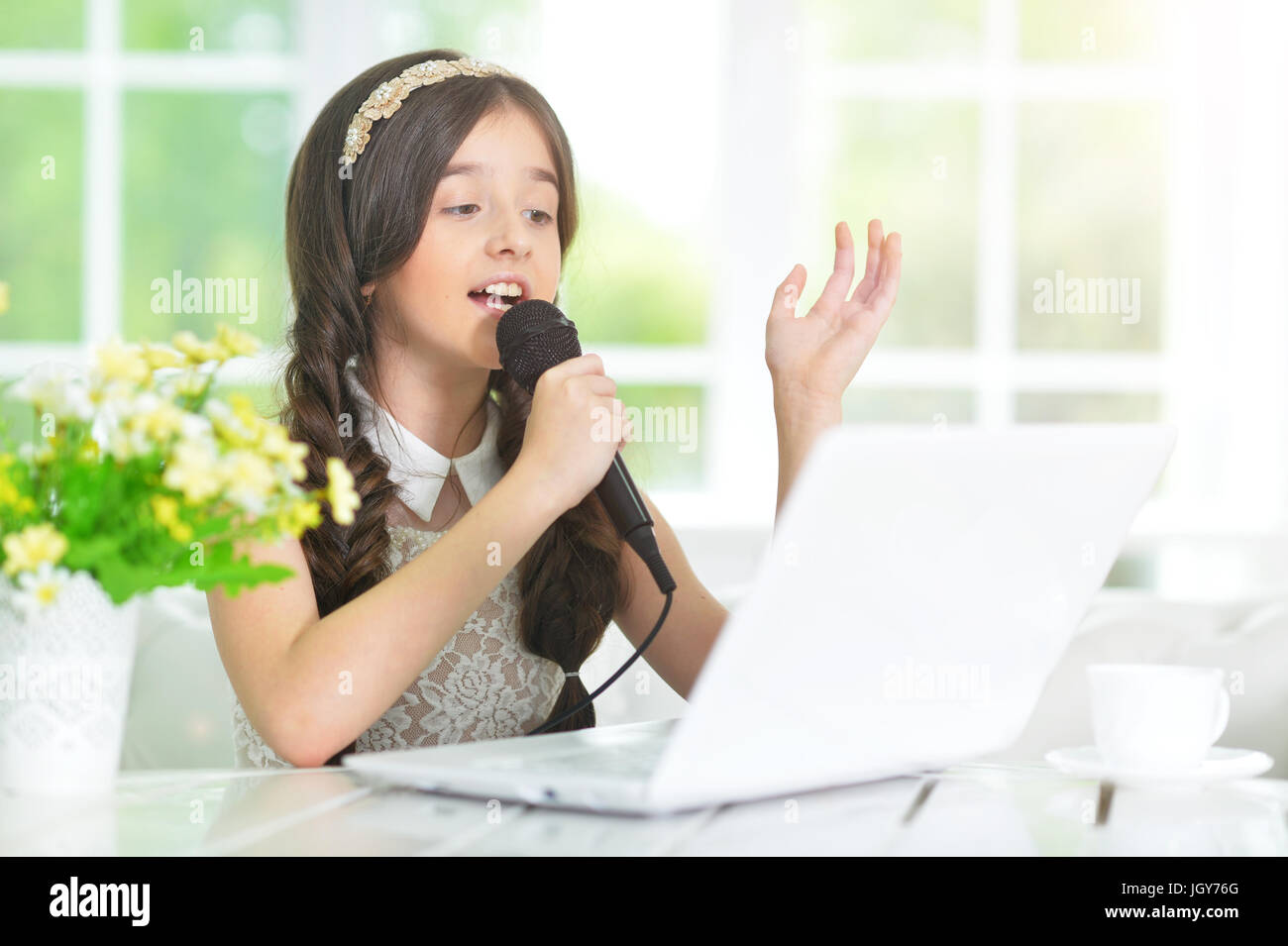 girl singing karaoke Stock Photo - Alamy