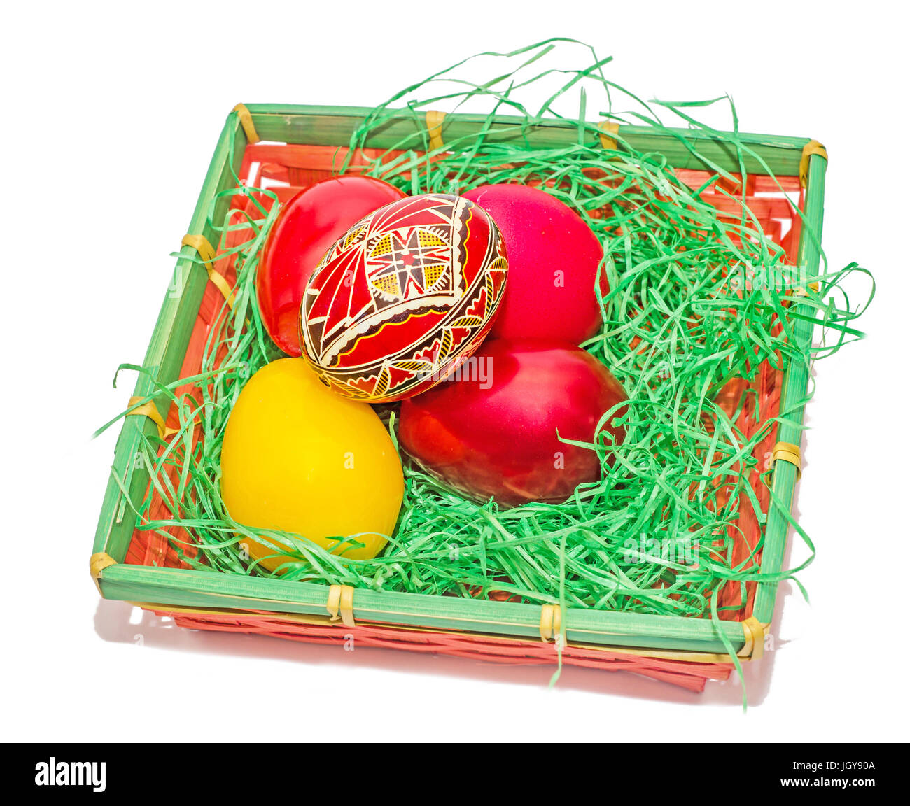 Romanian traditional colored easter eggs placed in a basket Stock Photo ...