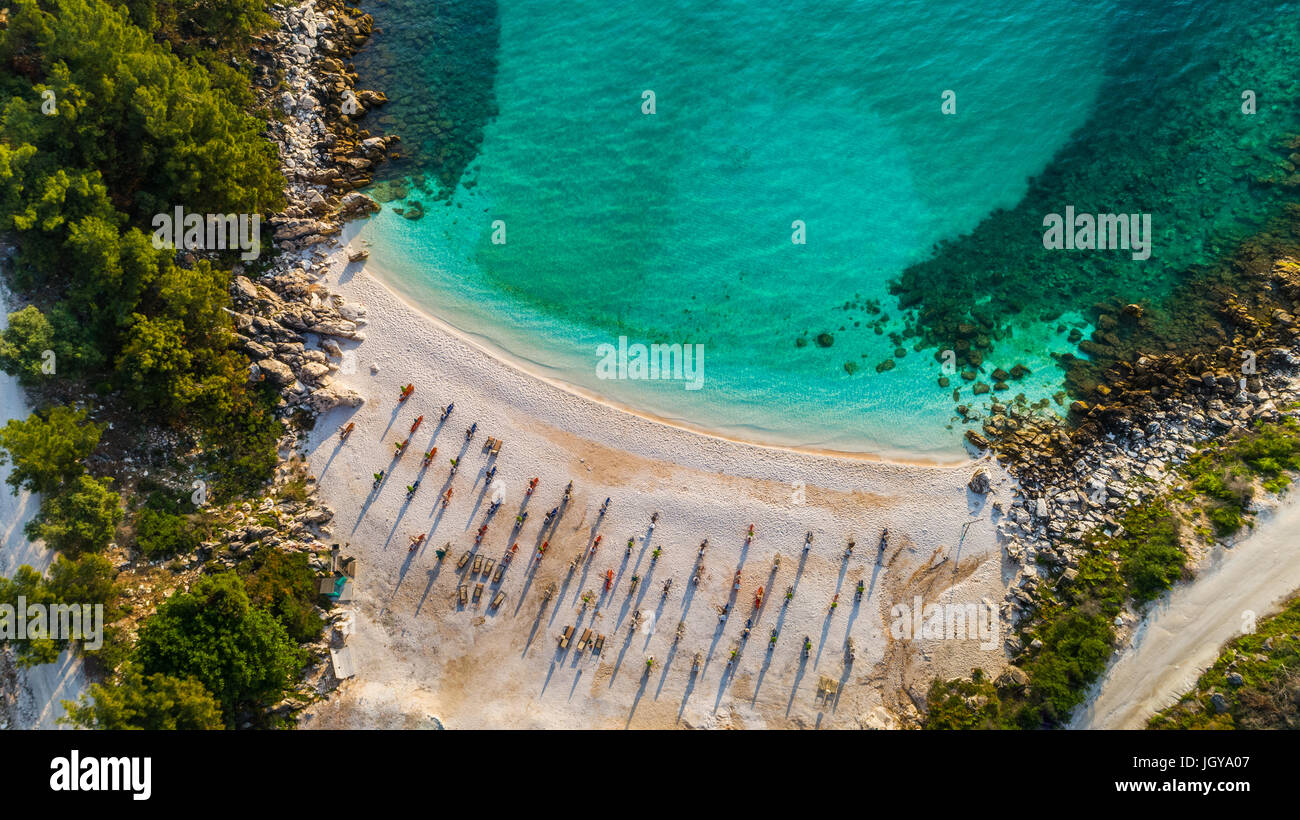 Aerial view of Marble beach. The most beautiful white beach in Greece ...