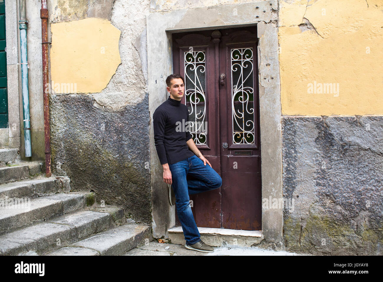 Sad man stands near wall hi-res stock photography and images - Alamy
