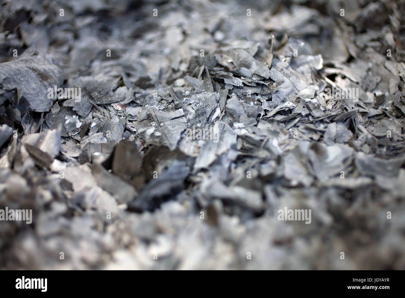 A pile of ashes remain after burning financial papers Stock Photo - Alamy
