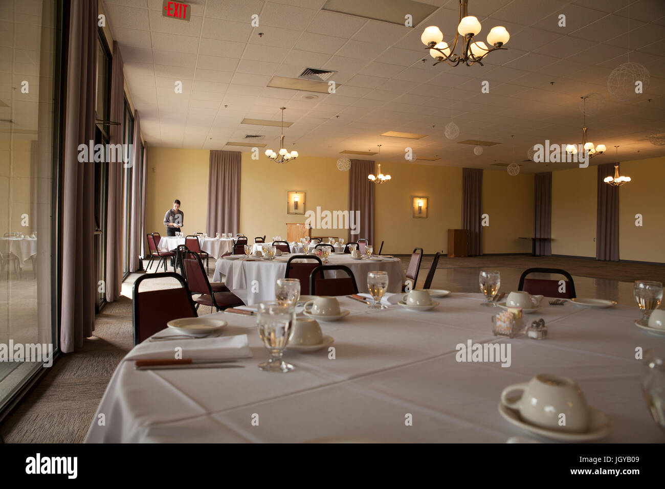 Interior of a banquet hall at a country club being readied for a ...