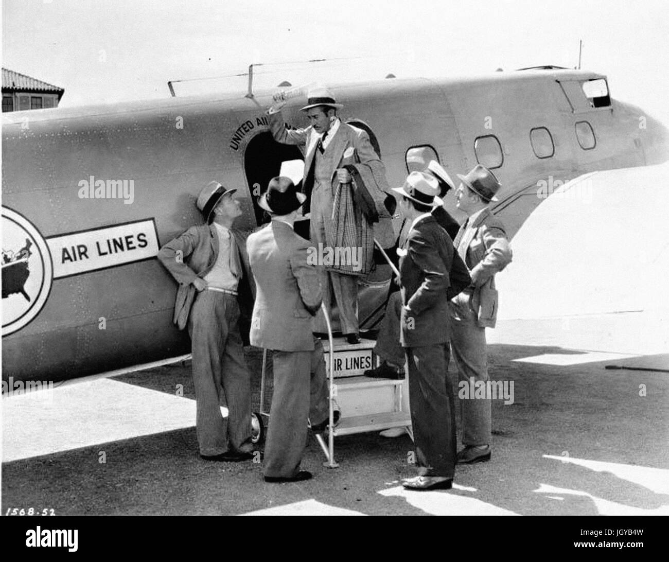 Man boarding United Air Lines Boeing 247 airplane Stock Photo - Alamy