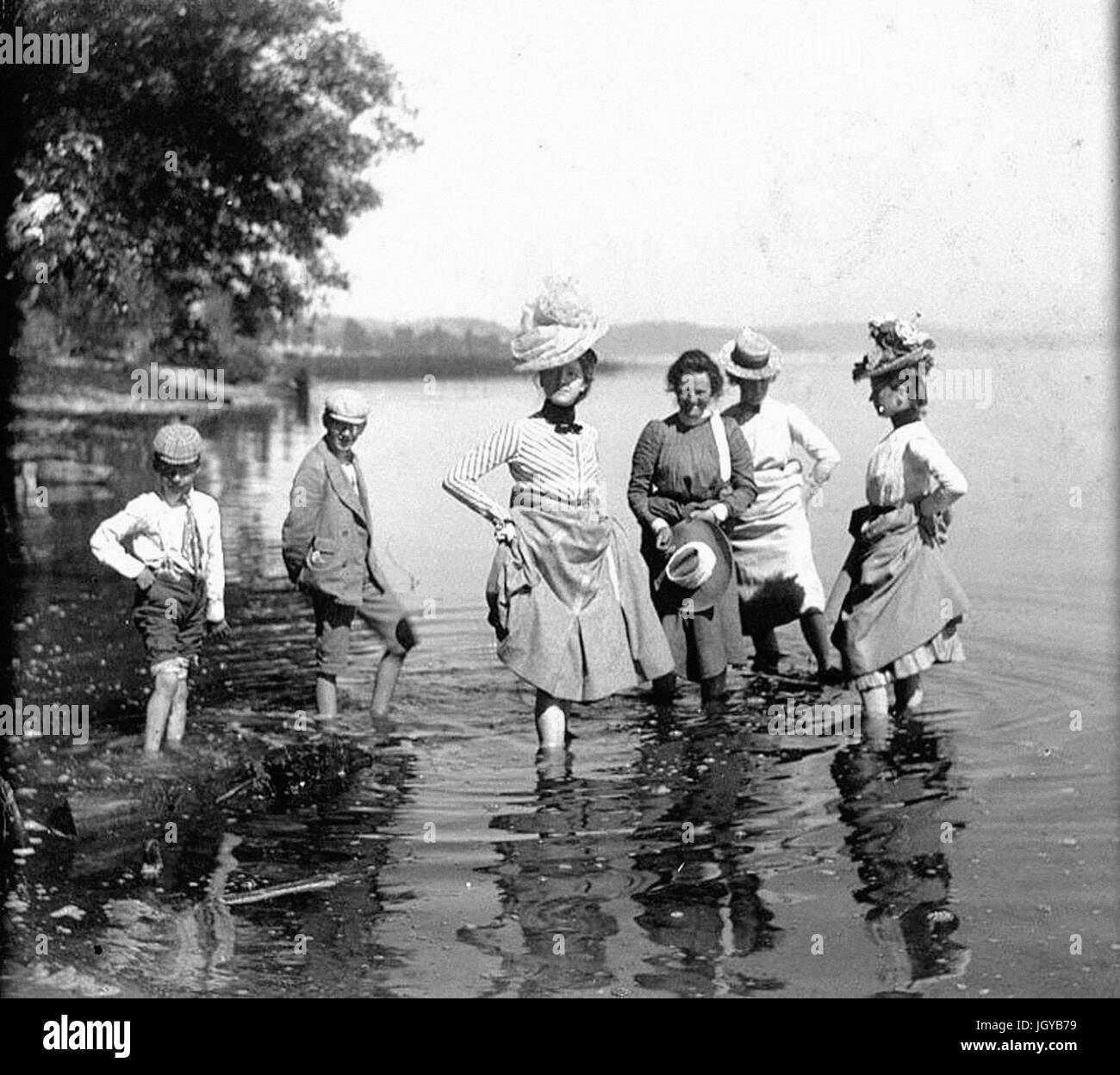 Women wading Black and White Stock Photos & Images - Alamy