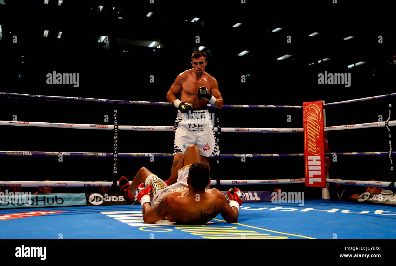Jake Ball stands over Jamie Ambler during their fight Stock Photo - Alamy