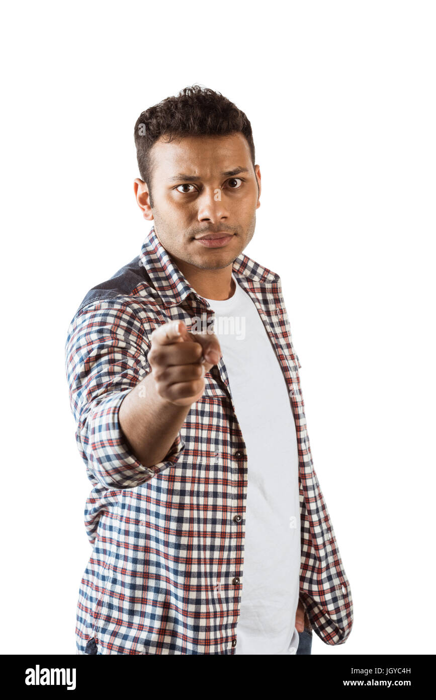 portrait of serious man pointing at camera isolated on white Stock ...