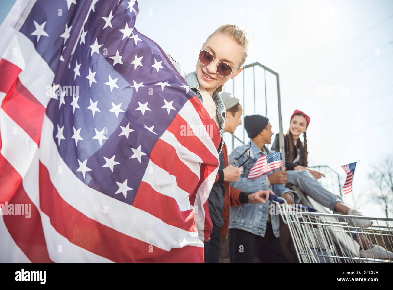 Girls waving flags hi-res stock photography and images - Alamy