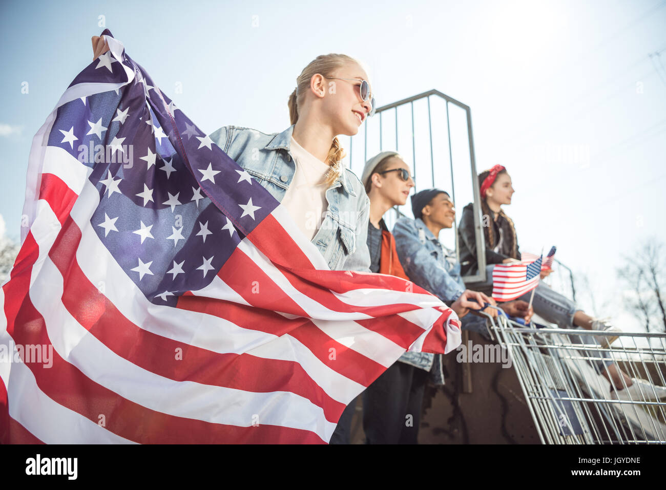 Girls waving flags hi-res stock photography and images - Alamy