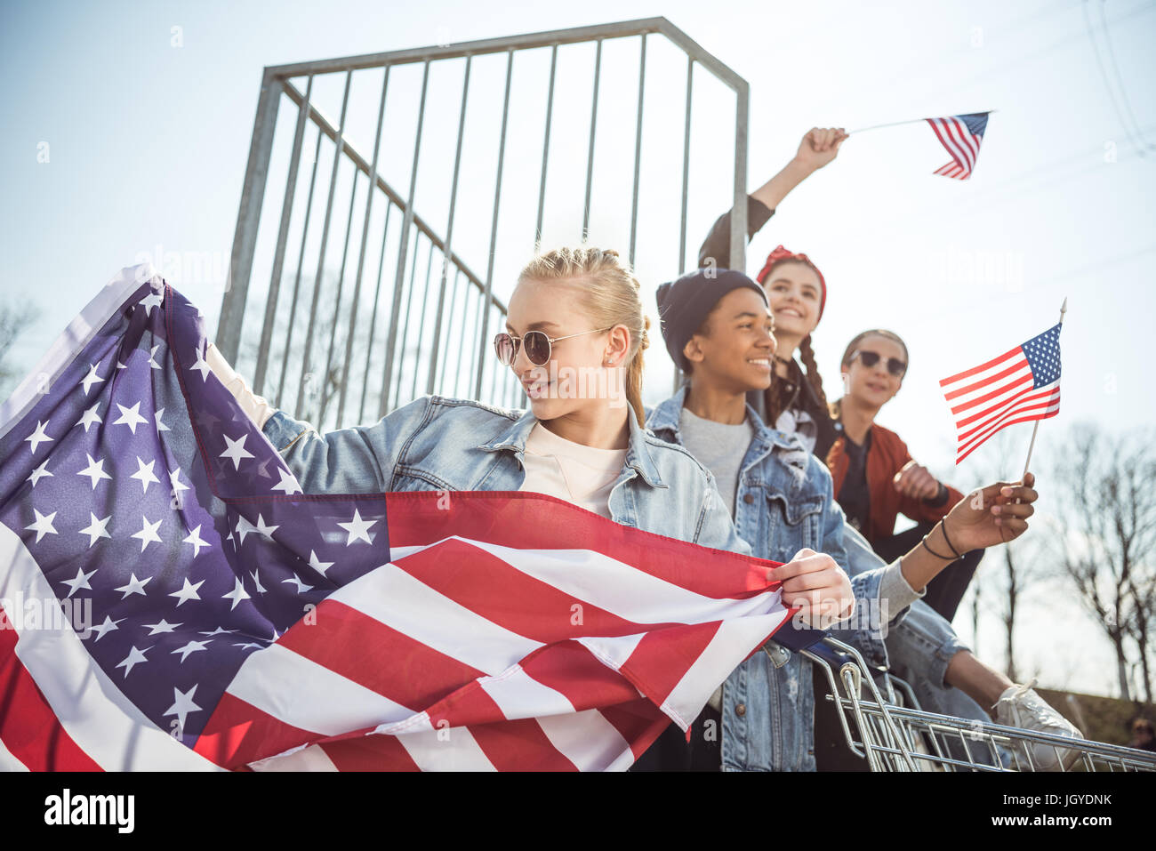 Girls waving flags hi-res stock photography and images - Alamy