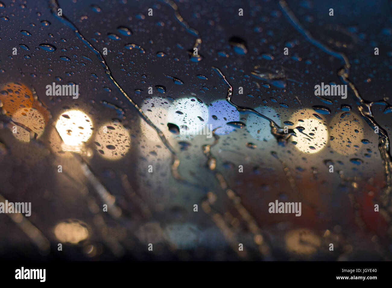 Raindrops on glass highway background hi-res stock photography and ...