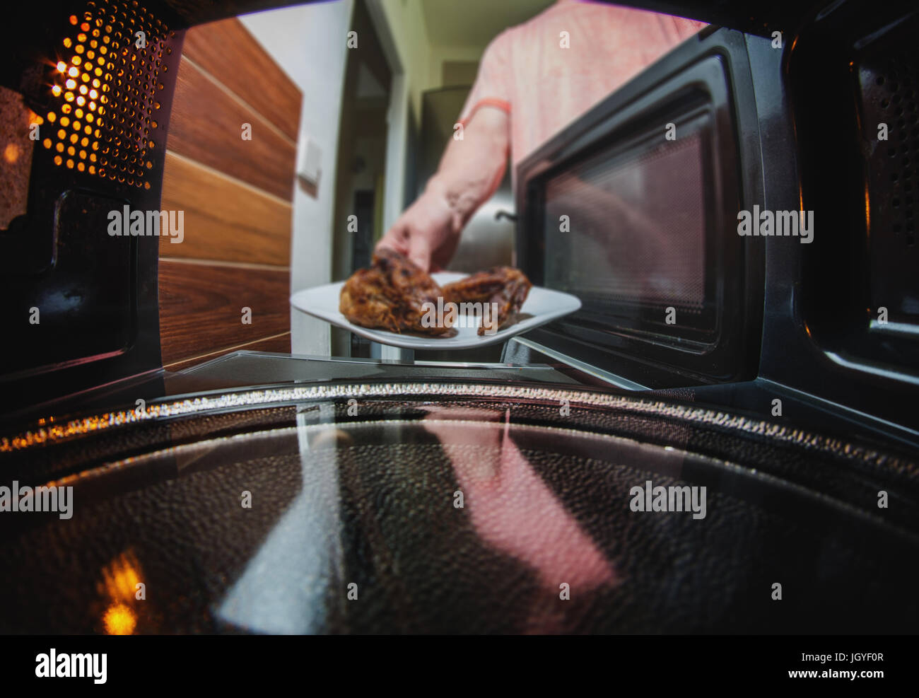 Microwave oven man hi-res stock photography and images - Alamy