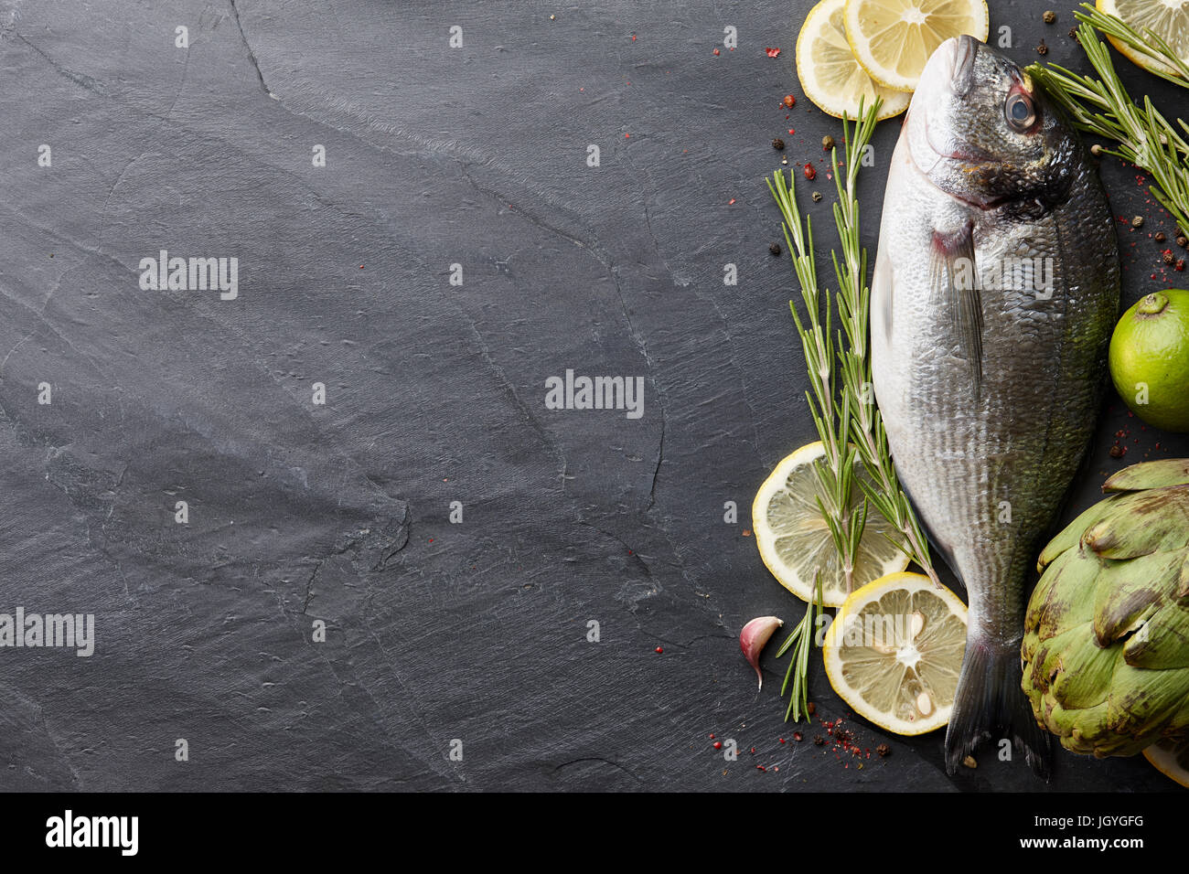 Sea bream fish cooking Stock Photo - Alamy