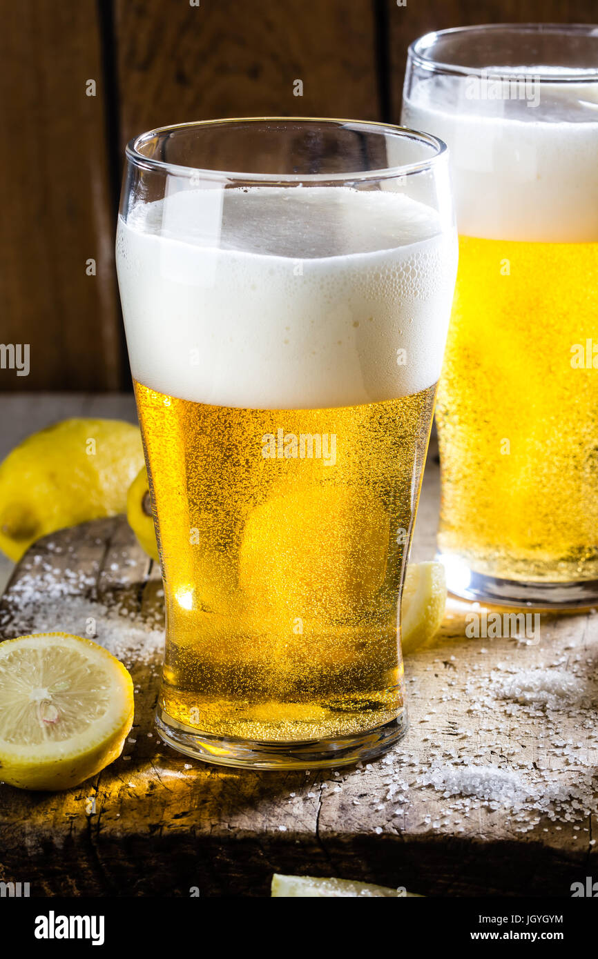 Ingredients for mexican chilean beer drink - Michelada. Beer, salt ...