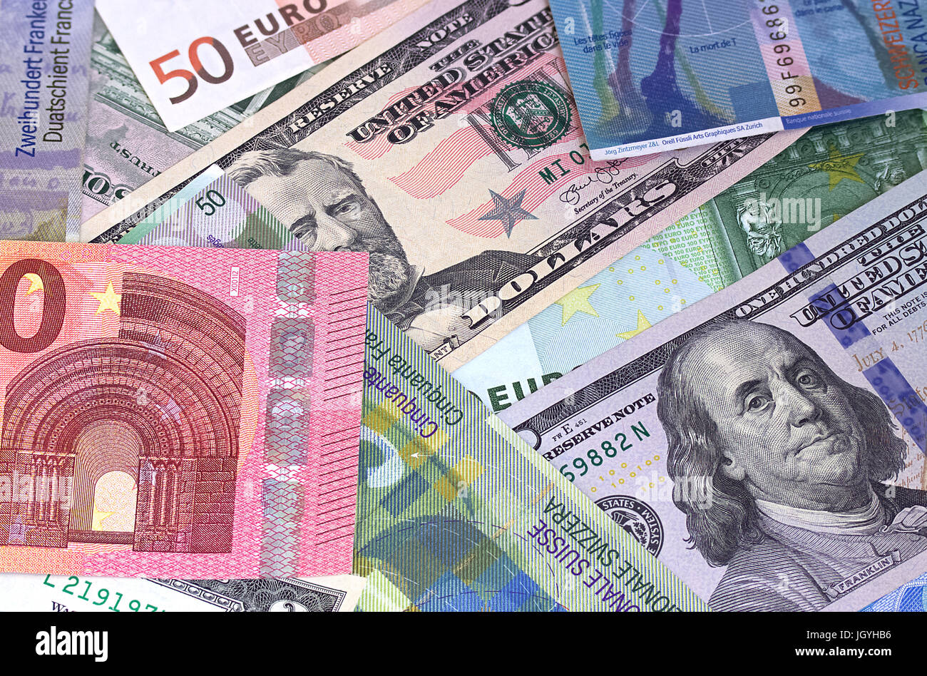 Abstract dollar euro and swiss franc background Stock Photo - Alamy