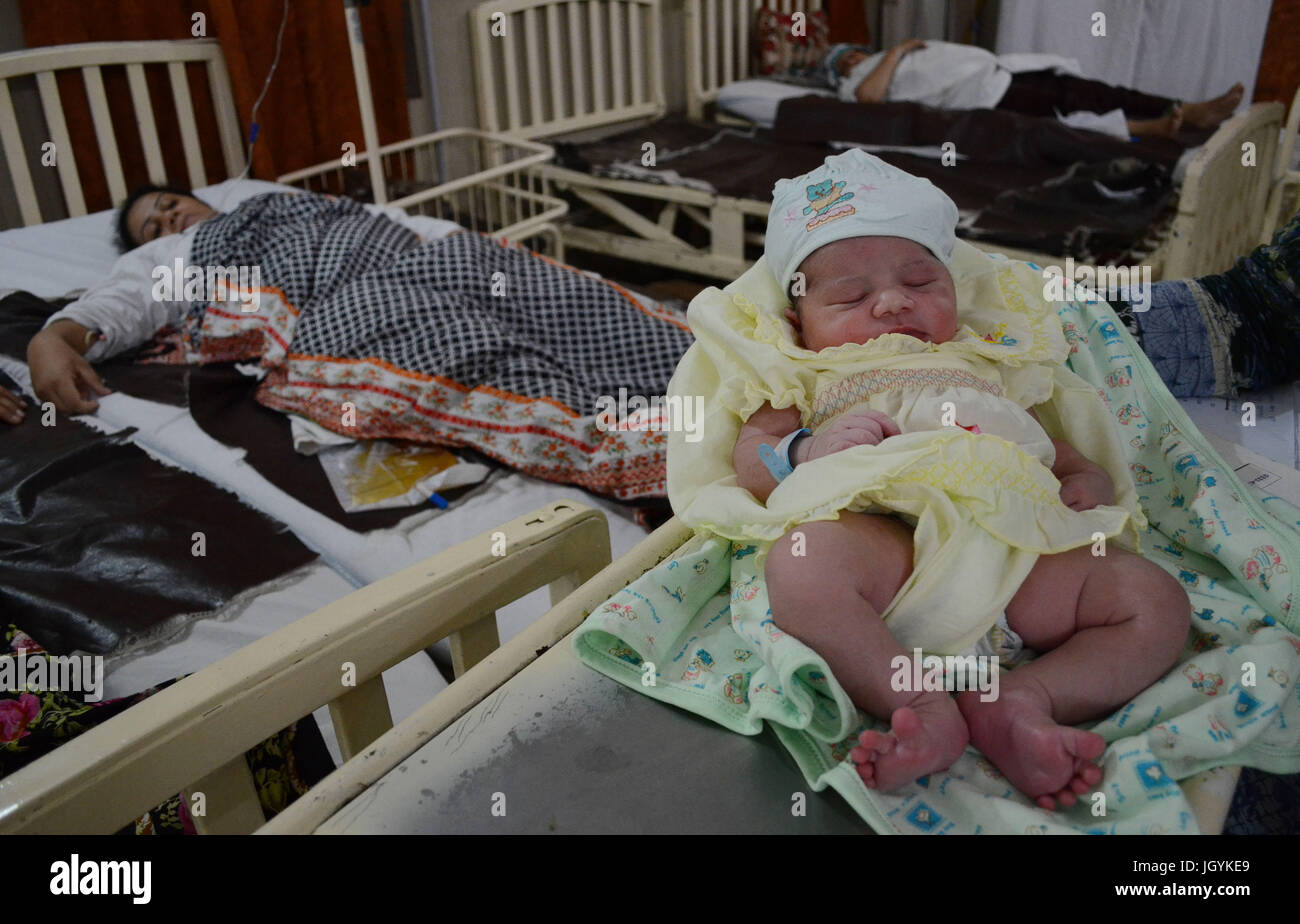 Pakistani mothers with their new born infants at local hospital on the ...