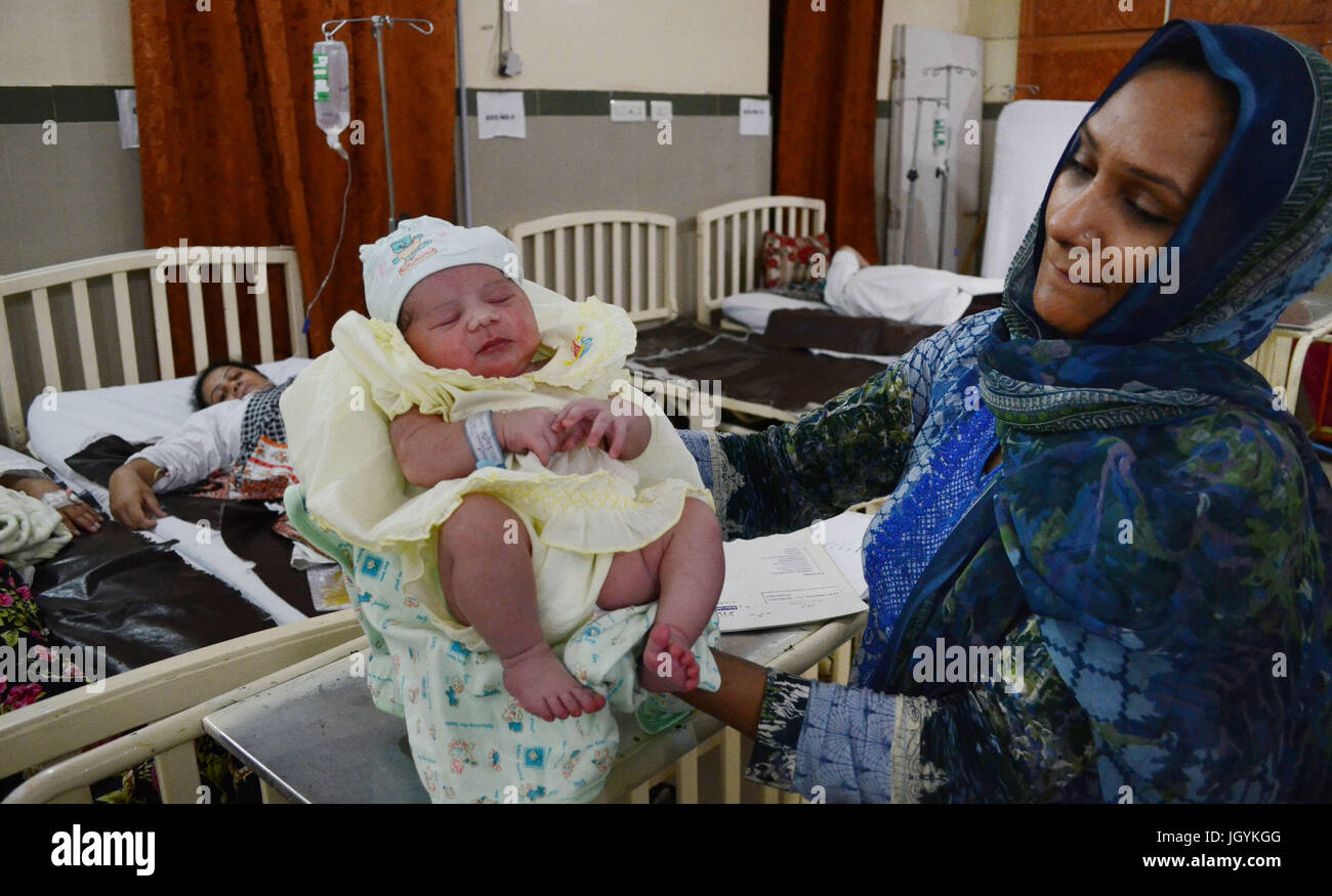 Pakistani mothers with their new born infants at local hospital on the ...