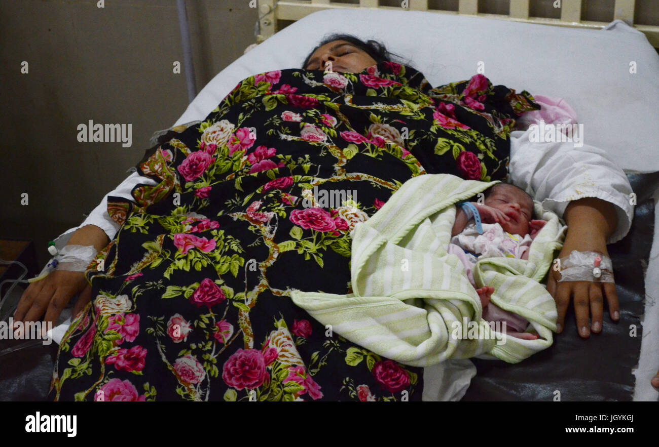Pakistani mothers with their new born infants at local hospital on the ...