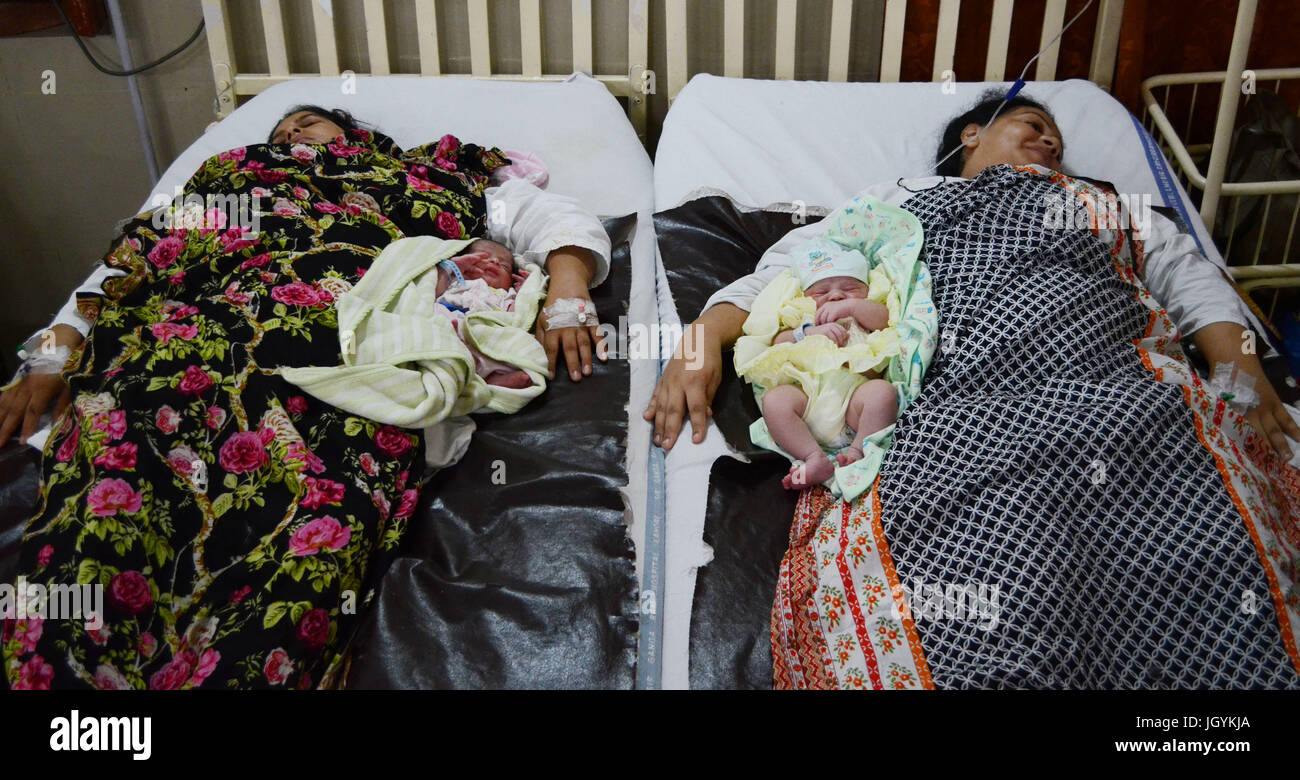 Pakistani mothers with their new born infants at local hospital on the ...