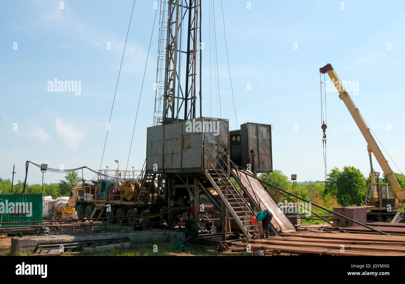 oil field, the oil workers are working Stock Photo - Alamy