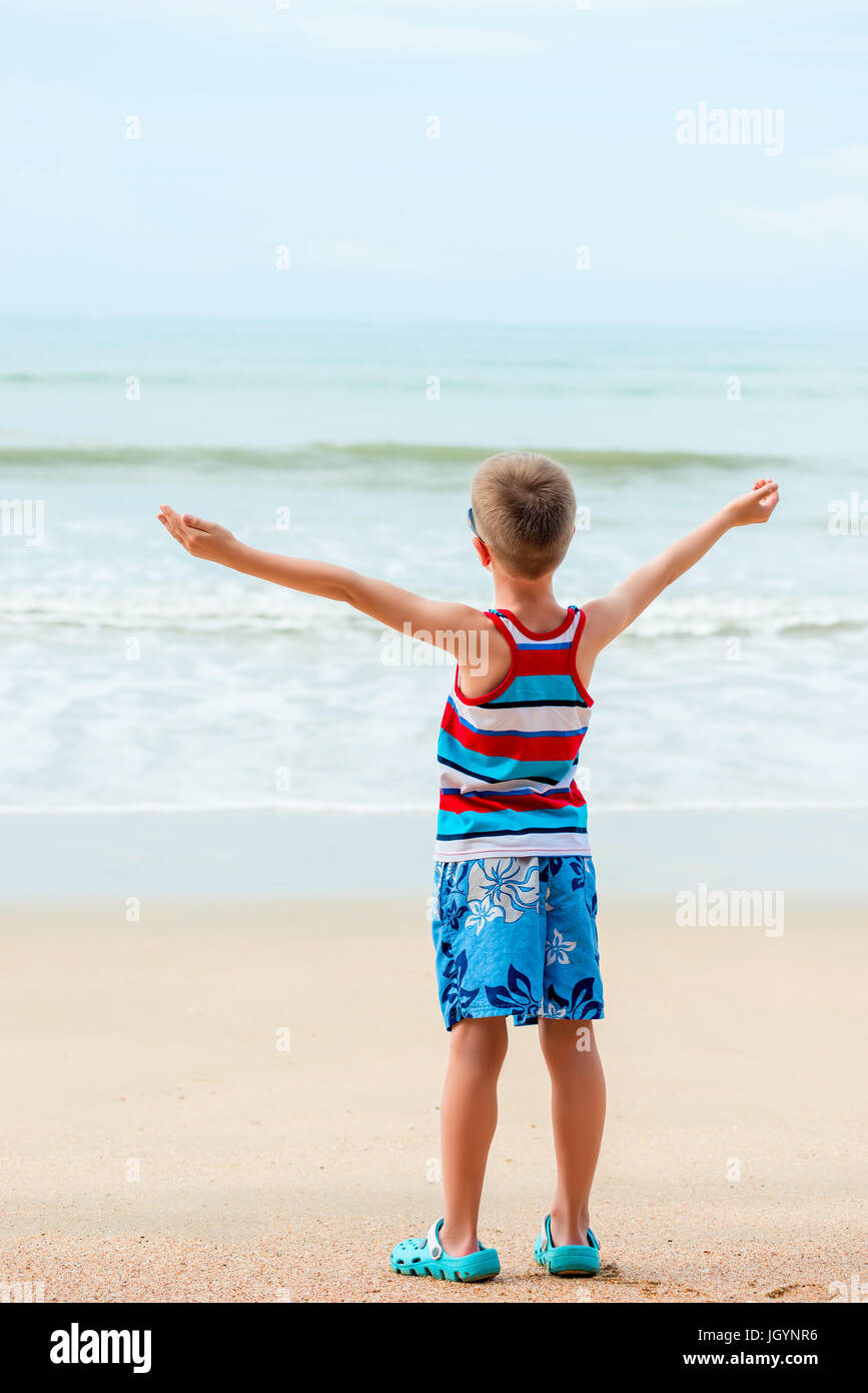 Boy arms out stretched hi-res stock photography and images - Alamy