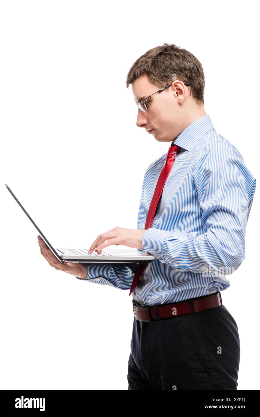 Vertical portrait of a chief accountant in glasses with a laptop on a ...