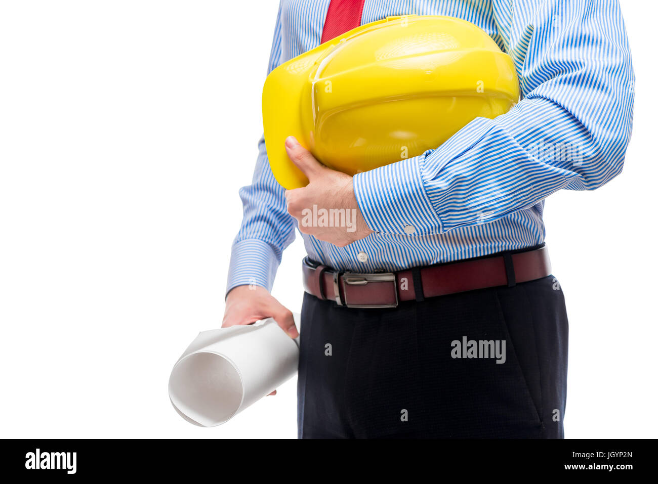 Hands of an architect close-up with a helmet and blueprints on a white ...