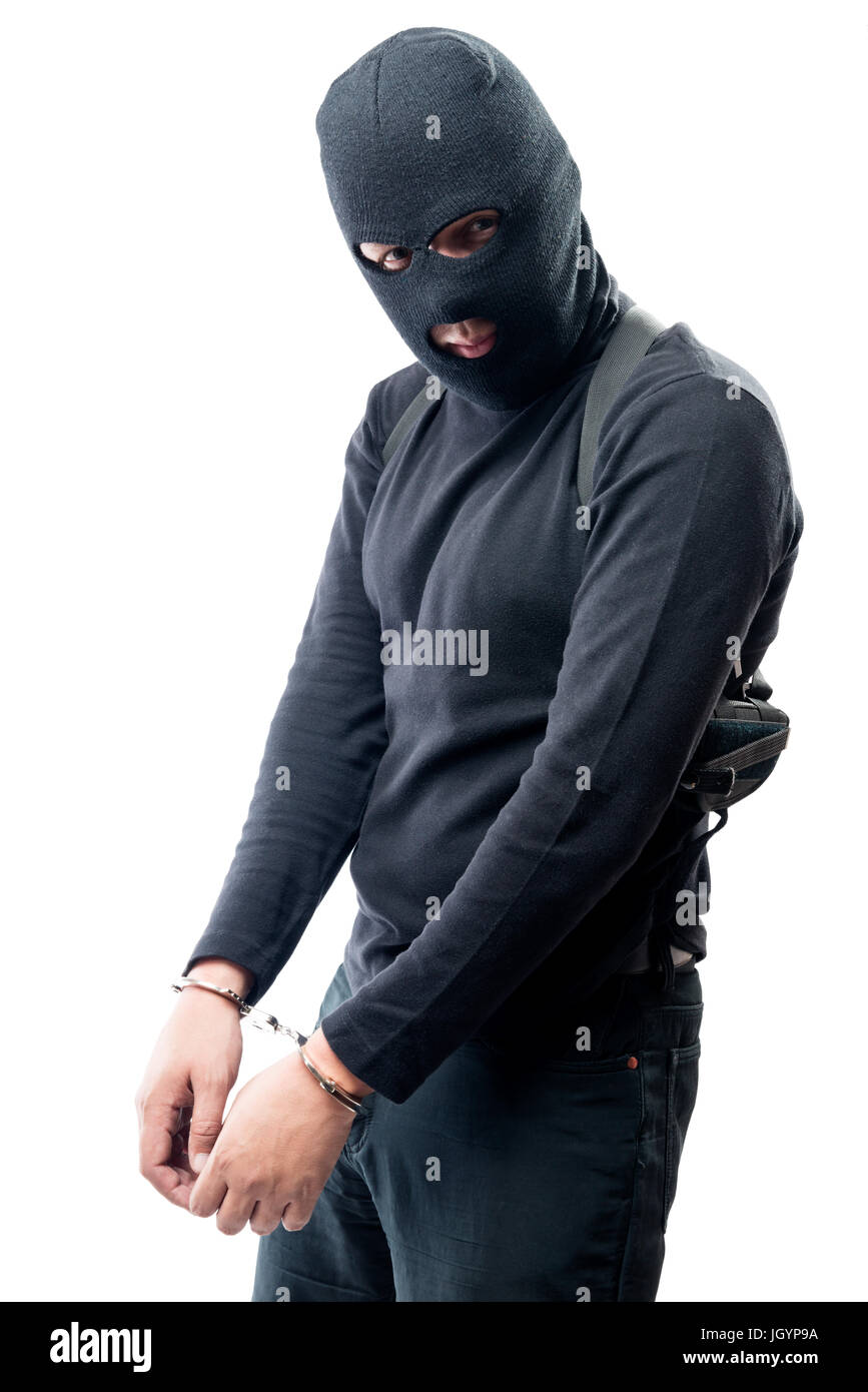 Criminal in handcuffs hi-res stock photography and images - Alamy