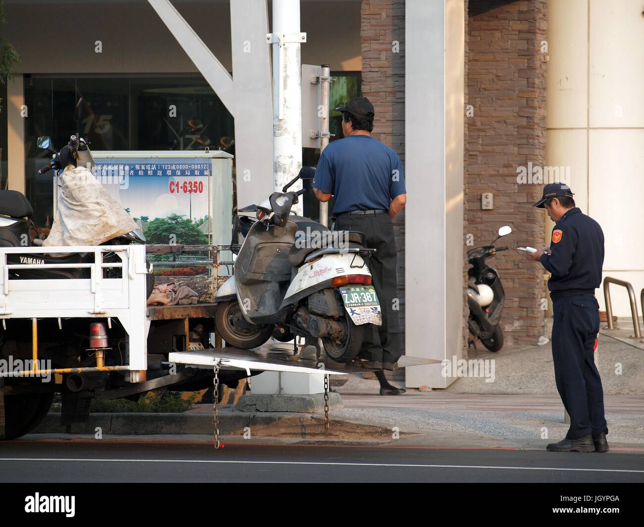 KAOHSIUNG, TAIWAN - DECEMBER 28: Police enforce new traffic rules and ...