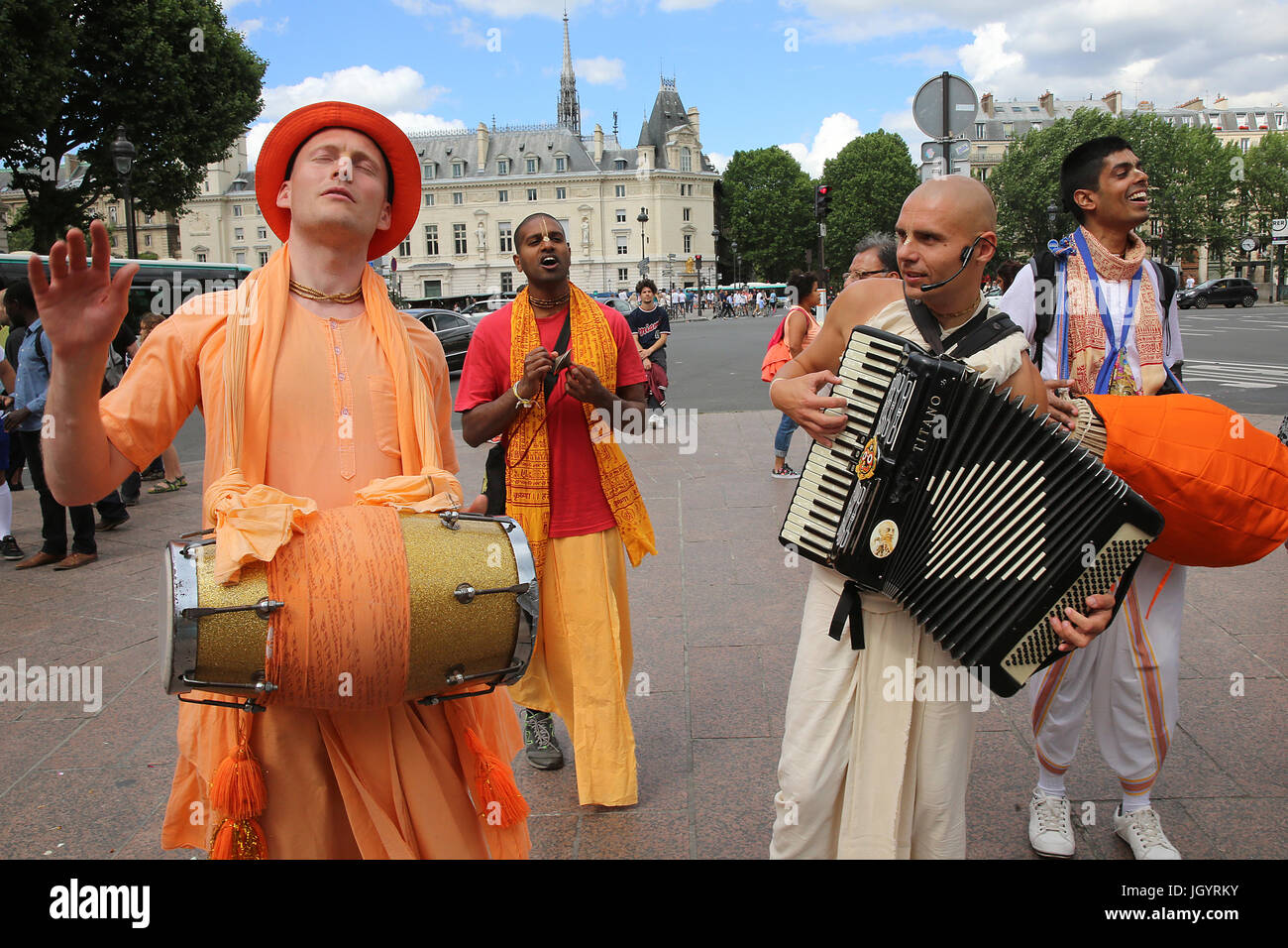 ISKCON devotees performing a harinam (devotional walk with dancing and ... ISKCON devotees performing a harinam (devotional walk with dancing and ...