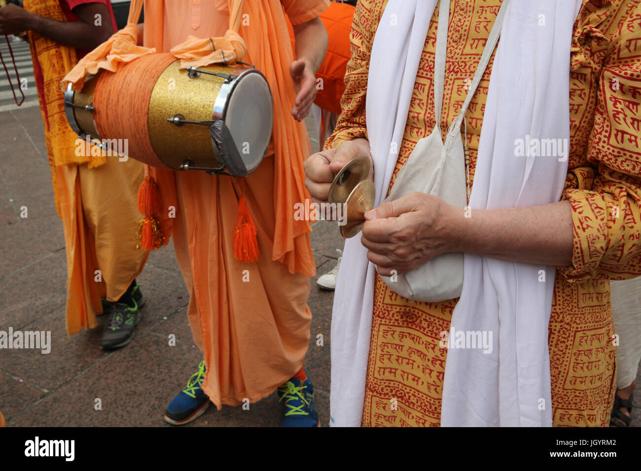 ISKCON devotees performing a harinam (devotional walk with dancing and ...
