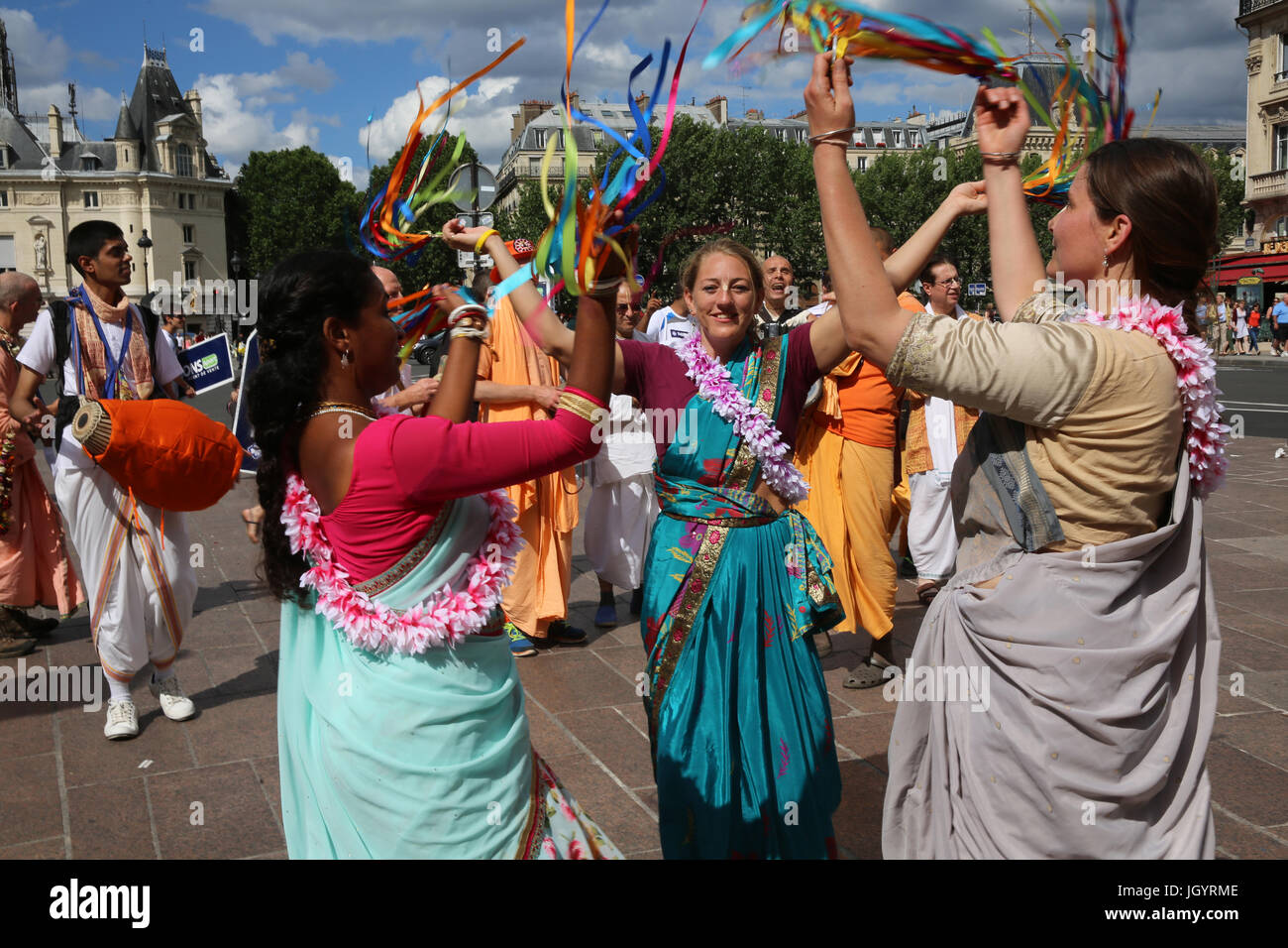 ISKCON devotees performing a harinam (devotional walk with dancing and ...