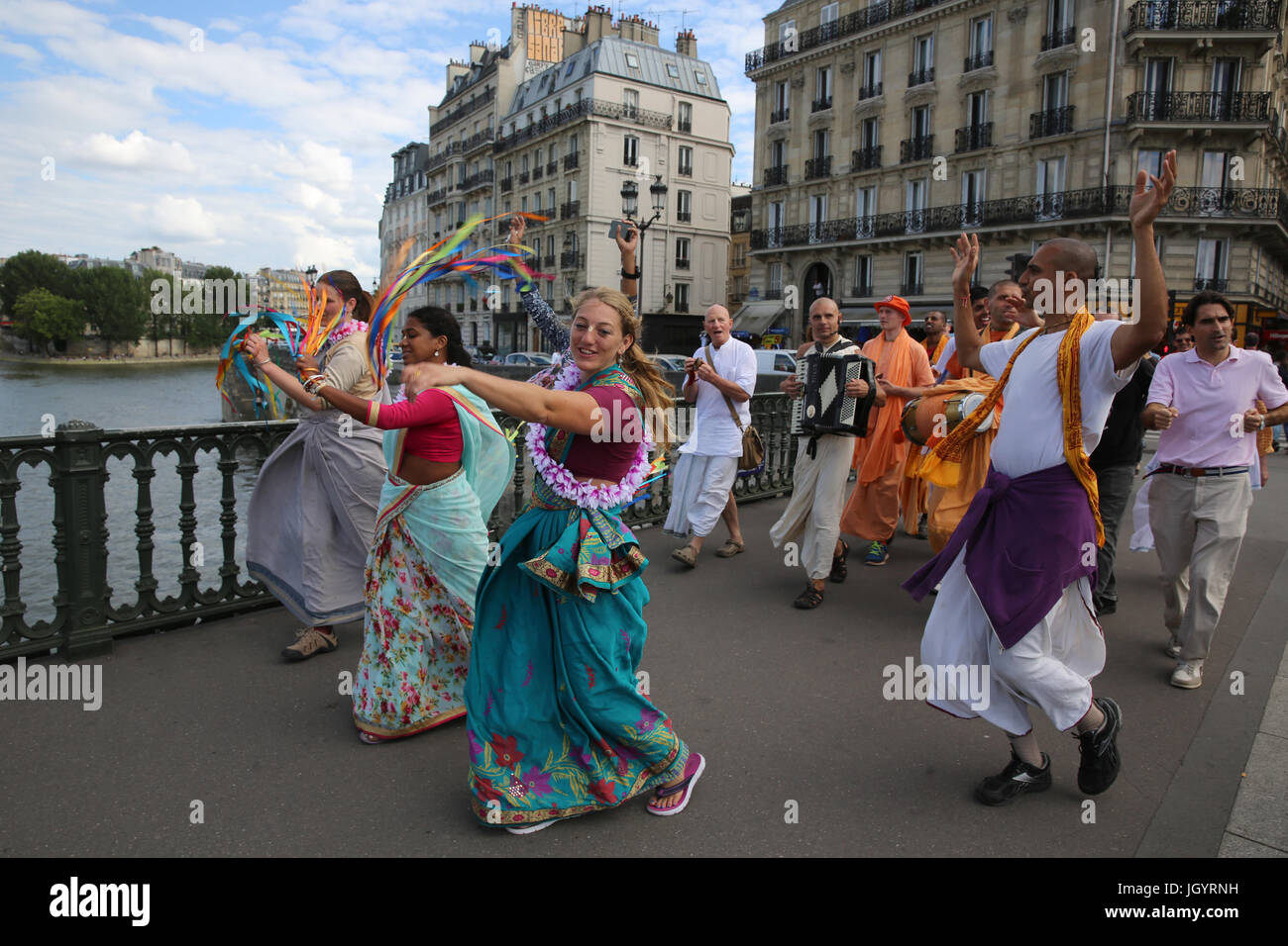 ISKCON devotees performing a harinam (devotional walk with dancing and ...