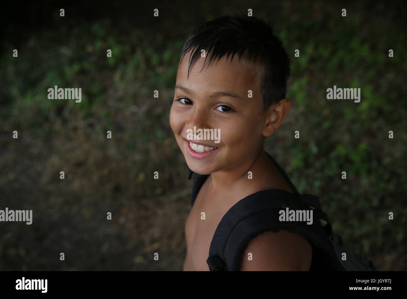 Boy smiling to camera hi-res stock photography and images - Alamy