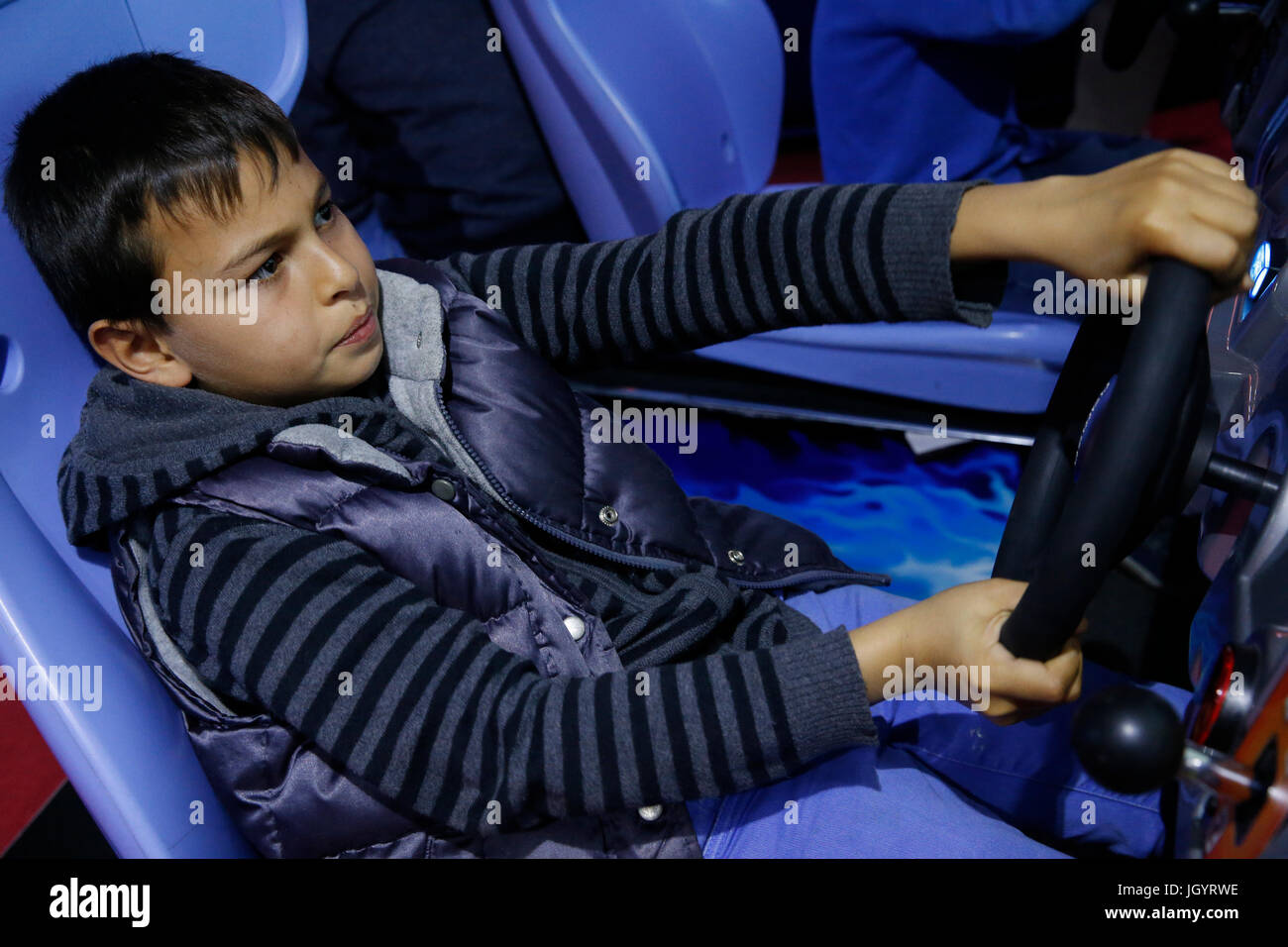 10-year-old boy playing a video game. France Stock Photo - Alamy
