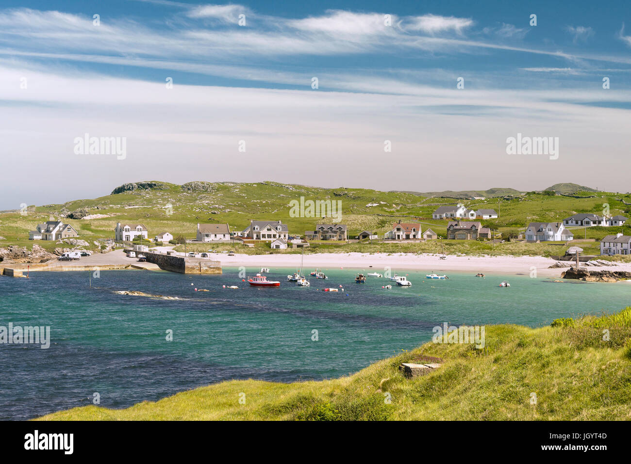 Fishing and pleasure boats moored at Portnablagh on the Causeway Coast ...