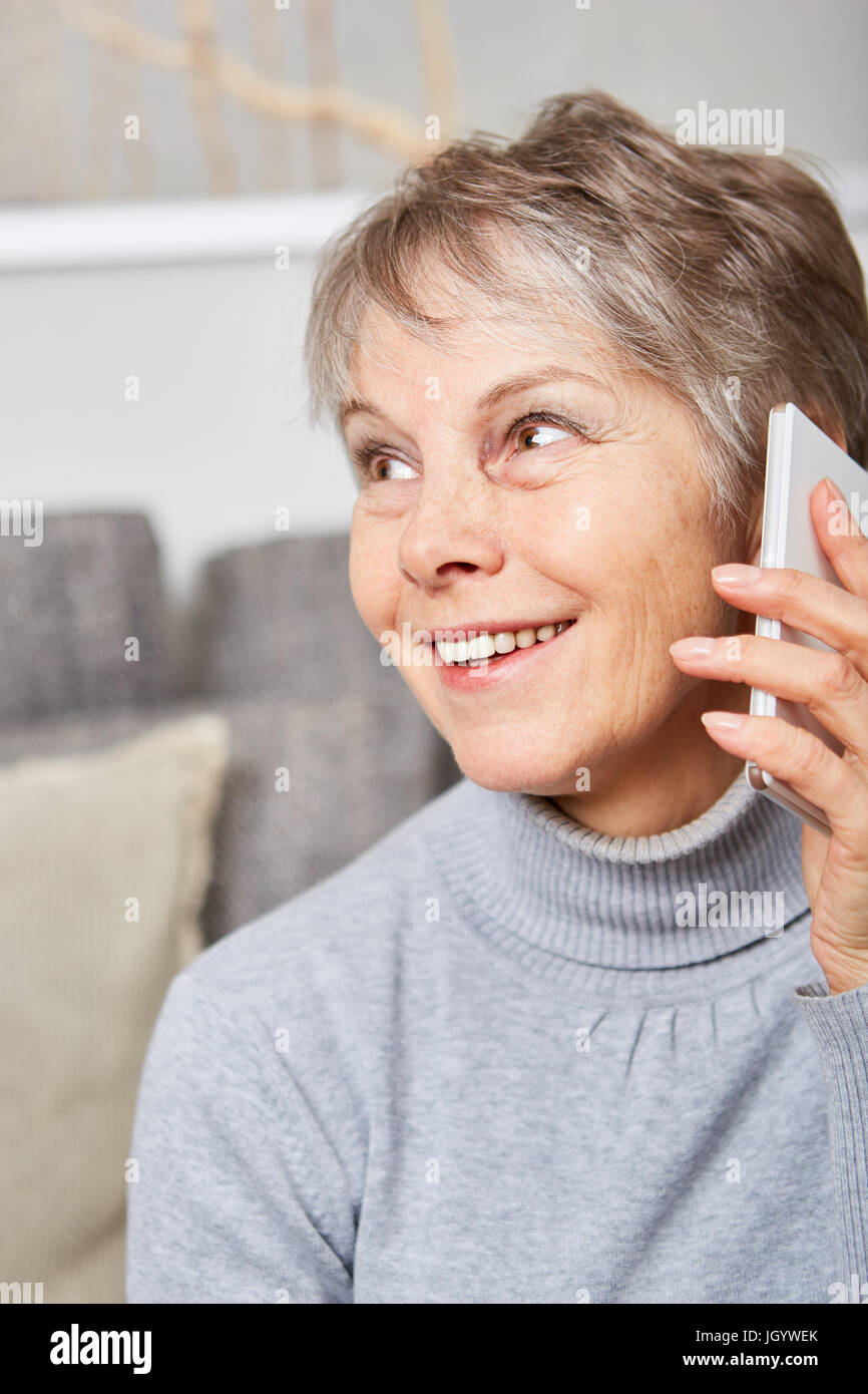 Senior woman smartphone making call hi-res stock photography and images ...