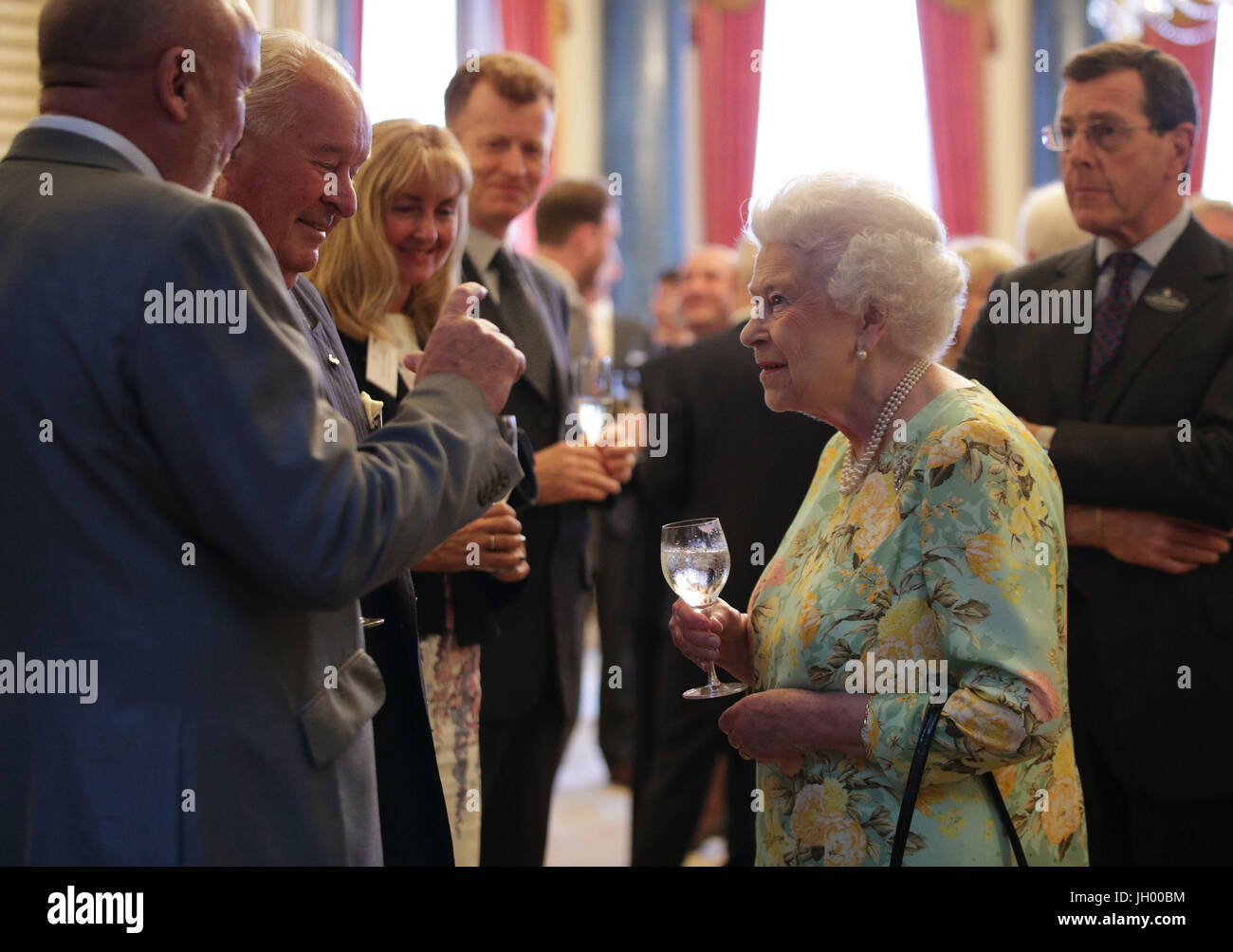 Queen Elizabeth II attend a reception for winners of The Queen's Awards ...