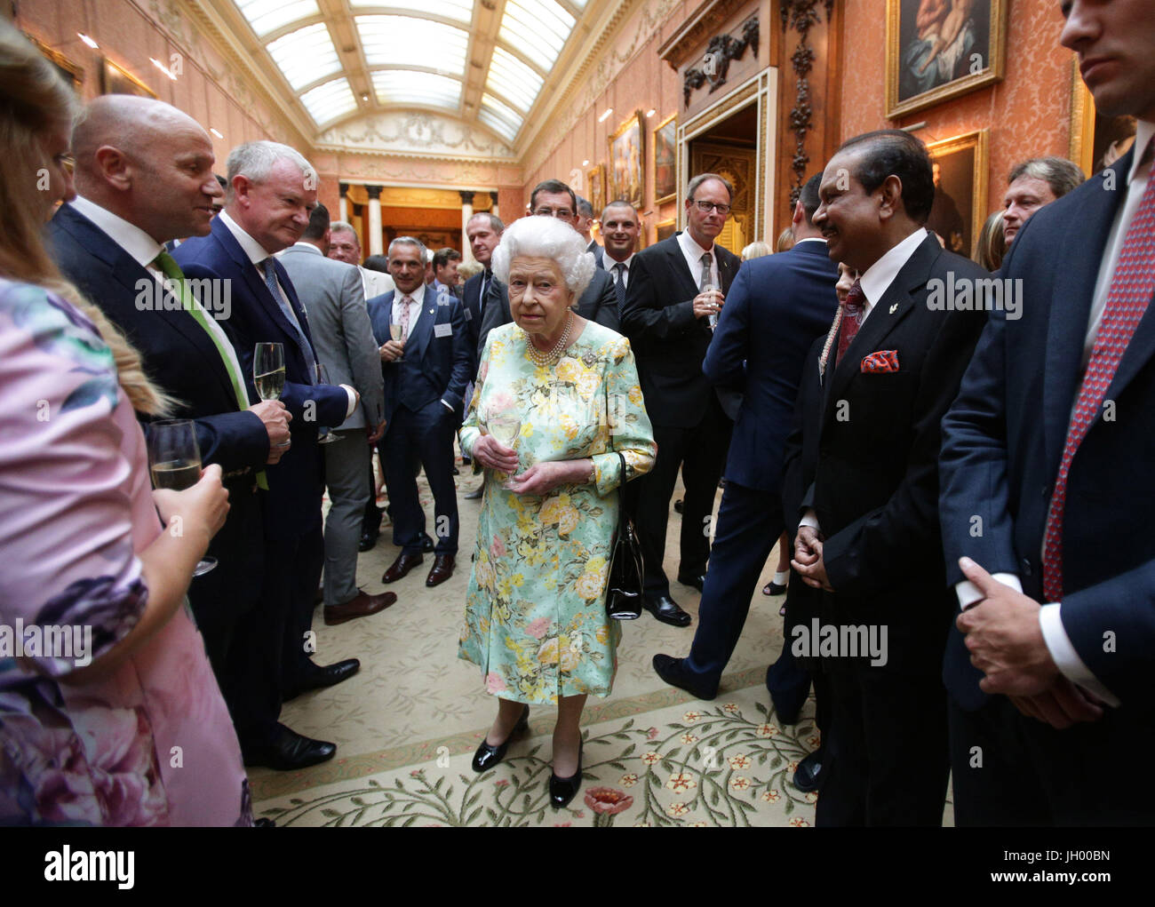 Queen Elizabeth II attend a reception for winners of The Queen's Awards ...