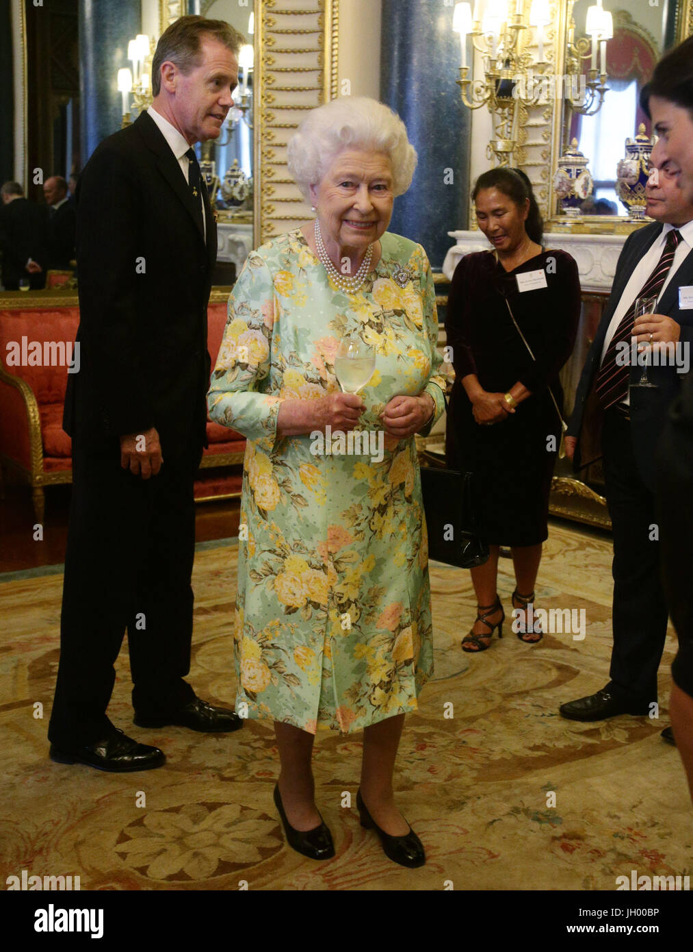 Queen Elizabeth II attend a reception for winners of The Queen's Awards ...